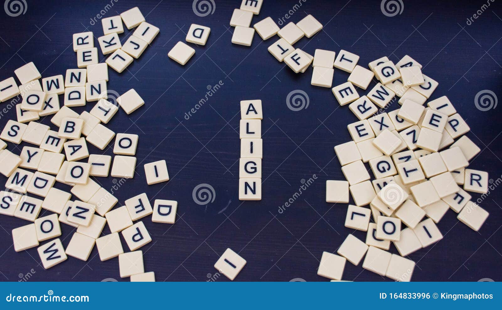 Align Tile Letters on a Black Background with Mixed Letters on Either ...