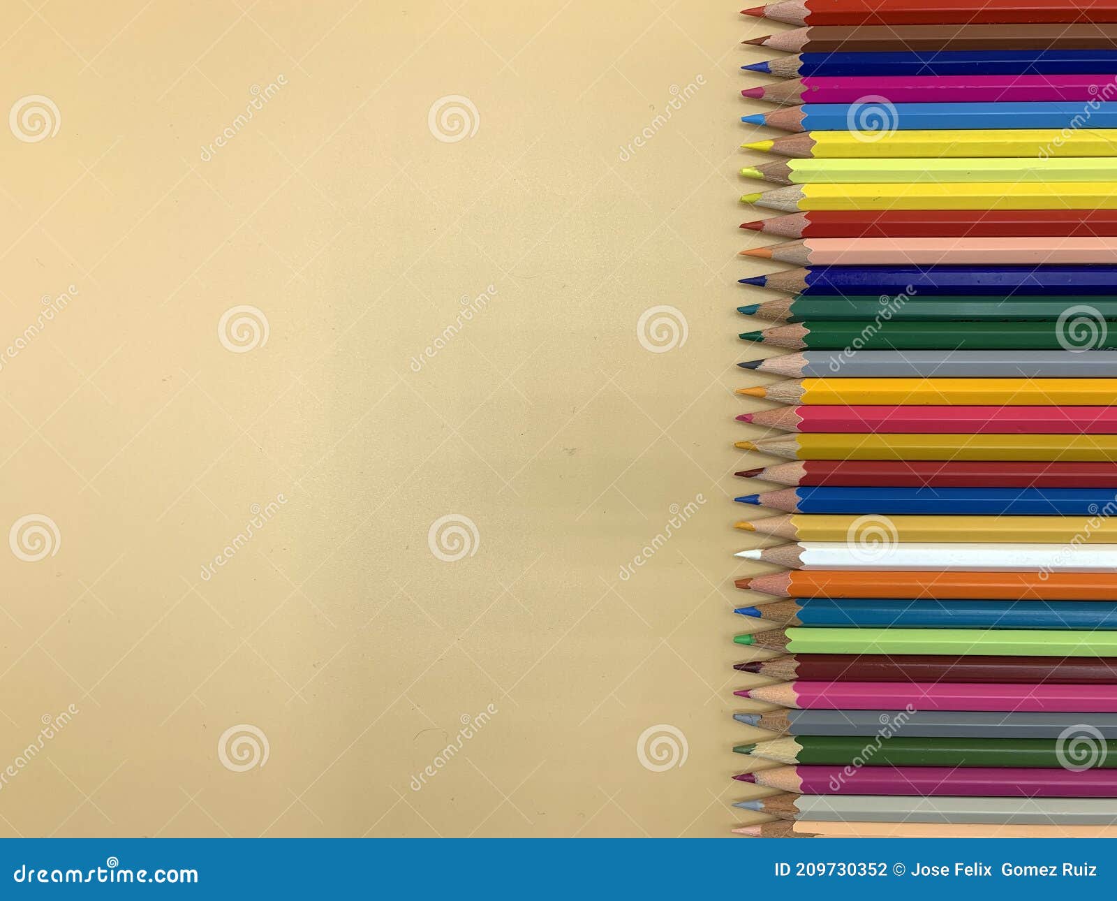 Aligned colored pencils stock photo. Image of color - 209730352