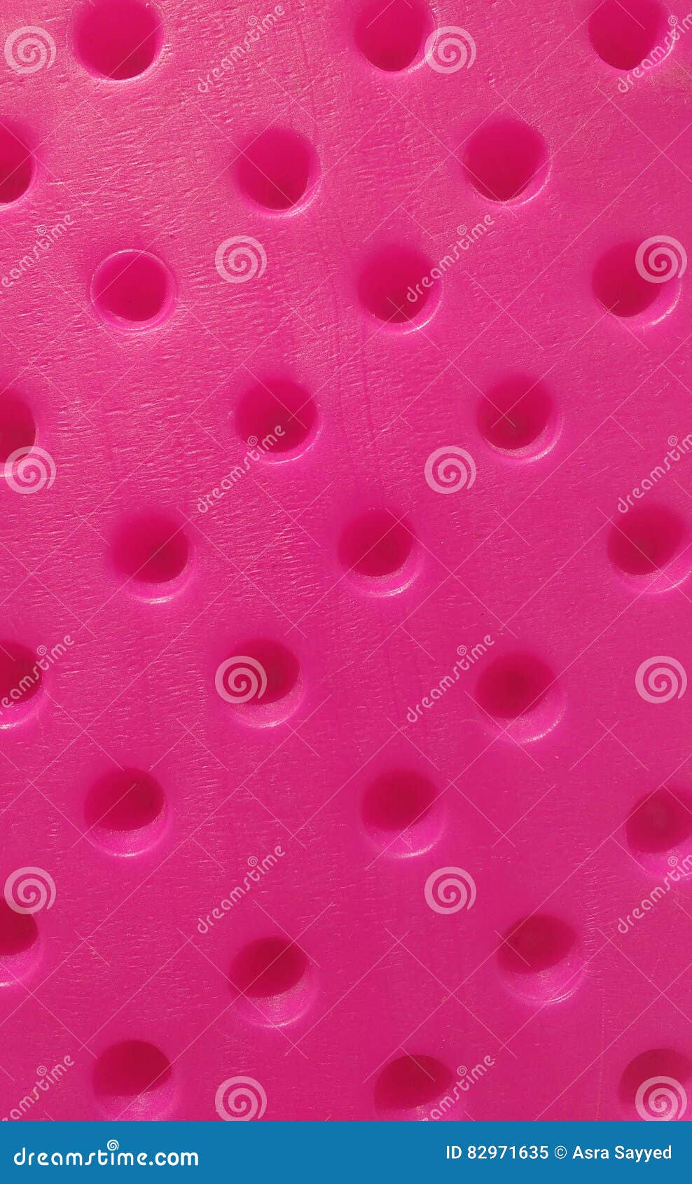 Aligned holes on plastic stock image. Image of holes - 82971635