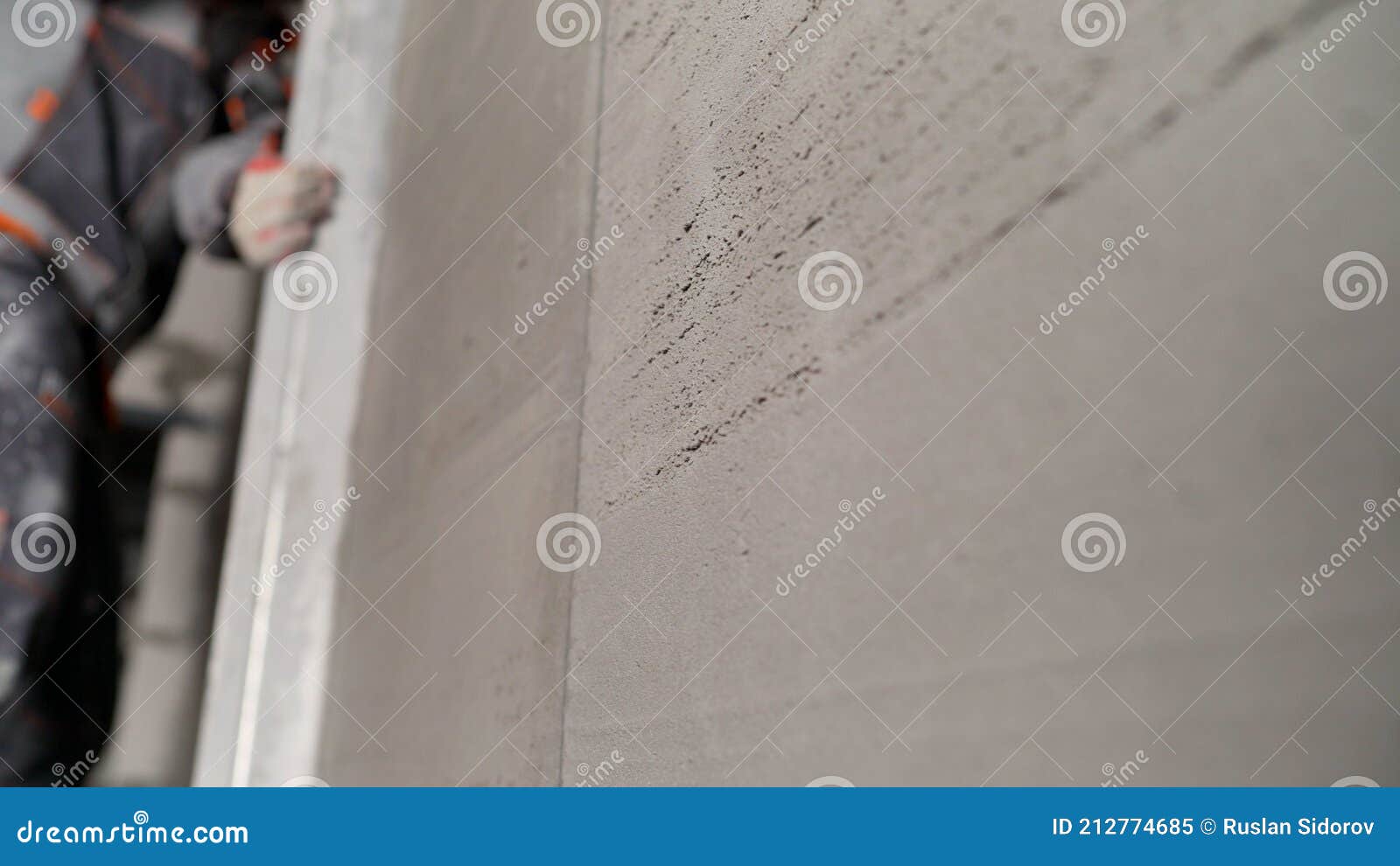 Aligning the Wall with Wire. Leveling the Mortar. a Mortar Worker Uses ...