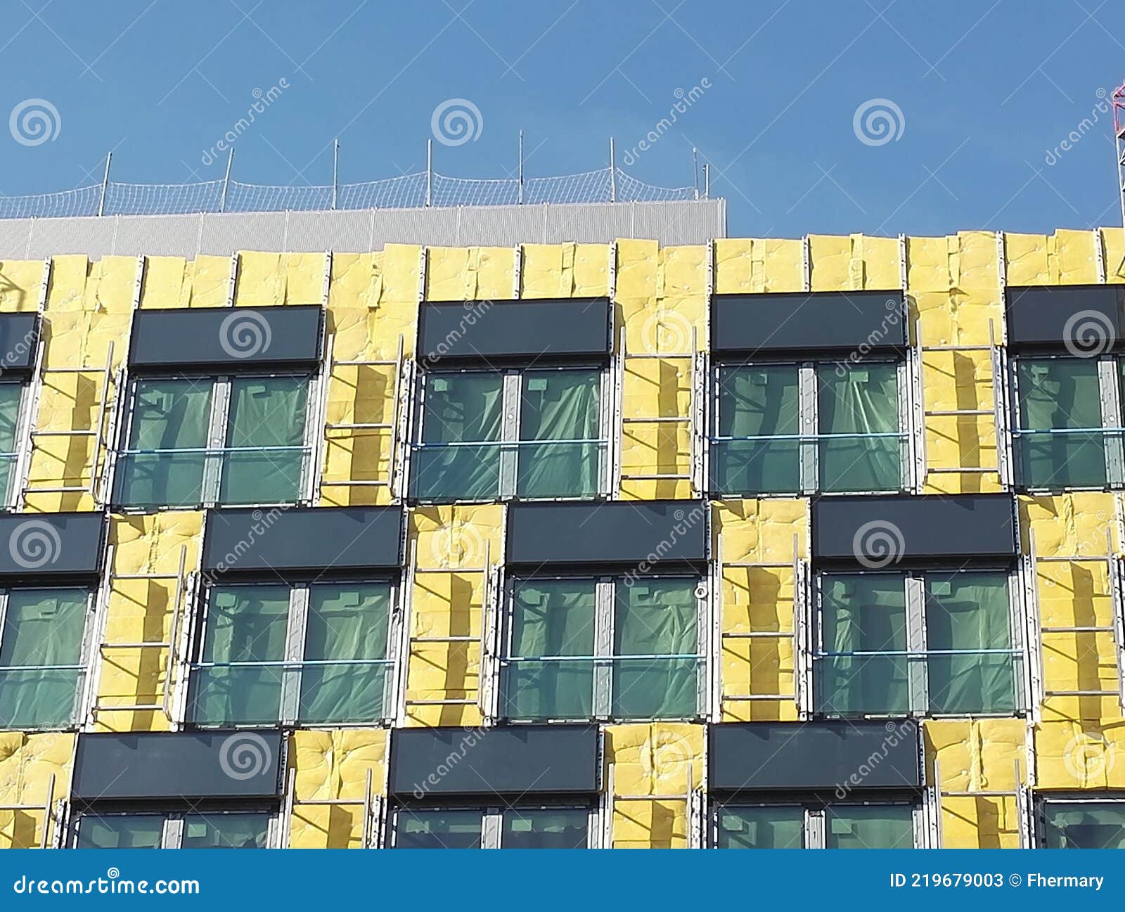 Alignment of Windows and Mineral Wool Insulation on a Building Under ...