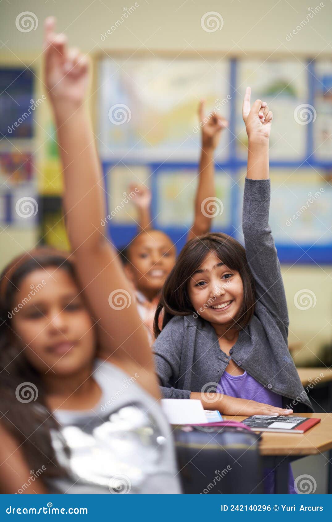 They All Know the Answer. a Group of Students Raising Their Hands in ...