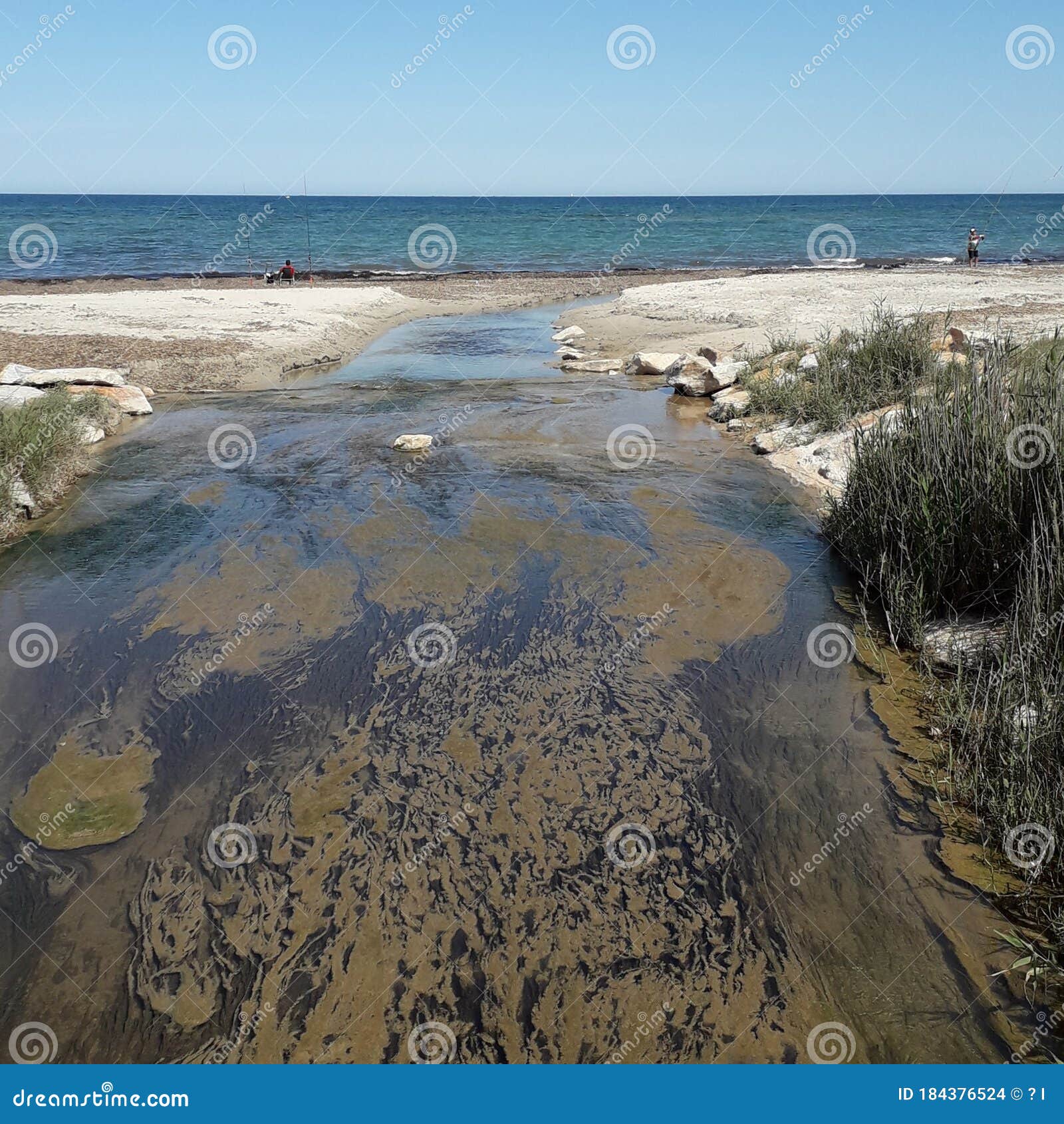 All rivers flow to the sea stock photo. Image of sand - 184376524