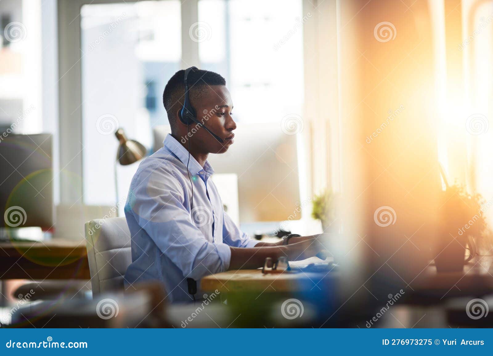 He is All about Solving Problems. a Male Agent Working in a Call Centre ...