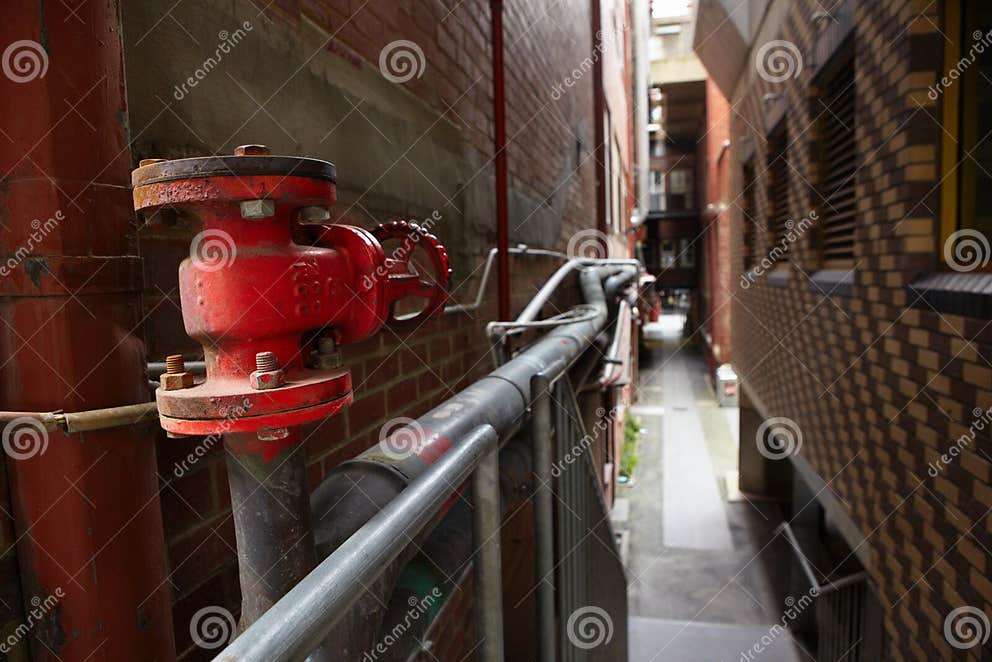 Alley stock photo. Image of water, pipes, building, alley - 26681328
