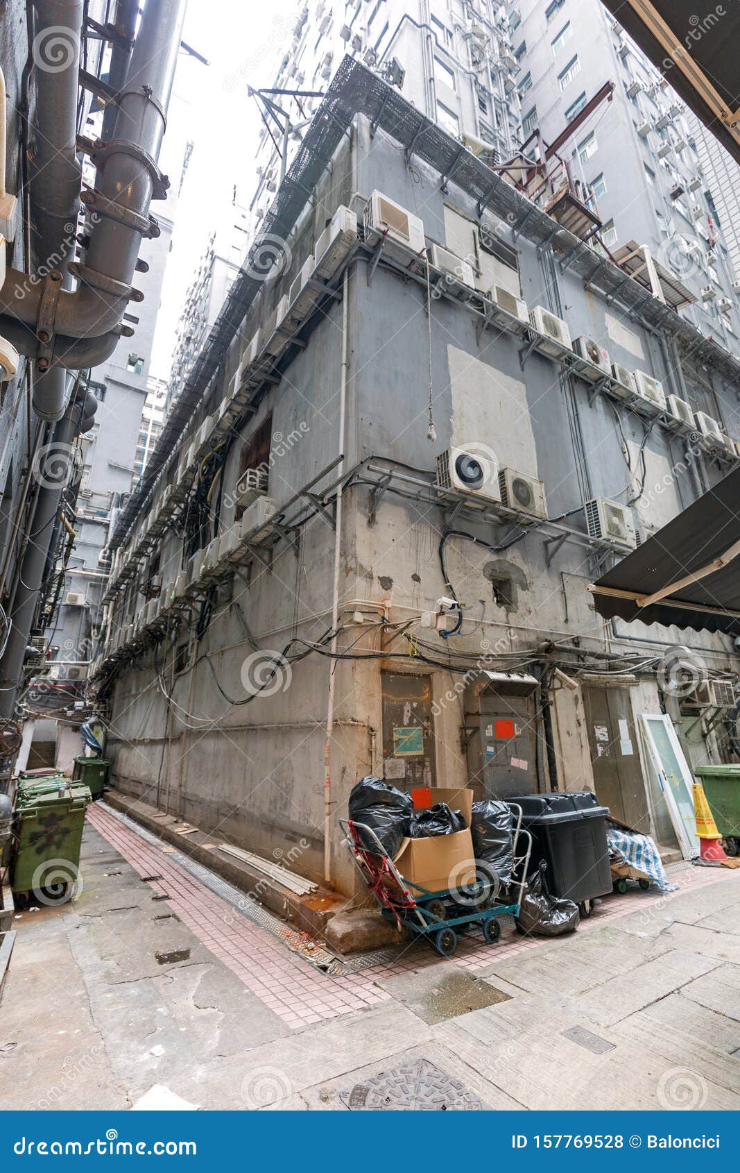 Alley Corner stock photo. Image of pipes, building, street - 157769528