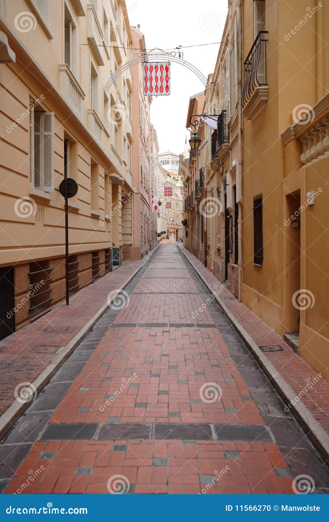 Alley with red cobblestone stock photo. Image of urban - 11566270