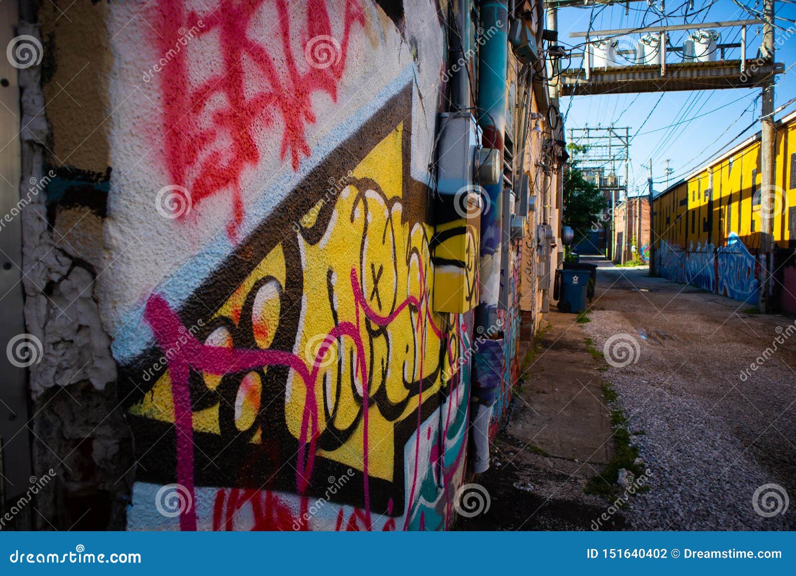 Alley Way with Graffiti on a Brick Wall Stock Photo - Image of door ...