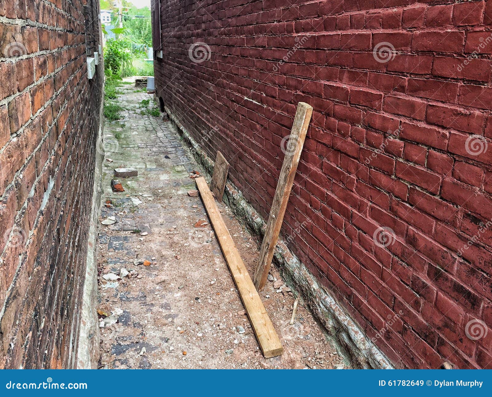Alleyway stock image. Image of grit, looking, bricks - 61782649