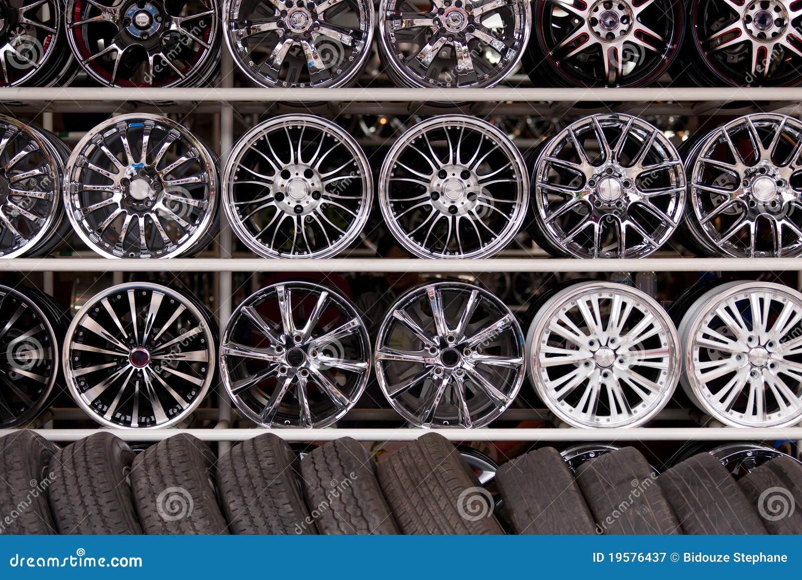 Alloy car wheels wall stock image. Image of circle, store - 19576437