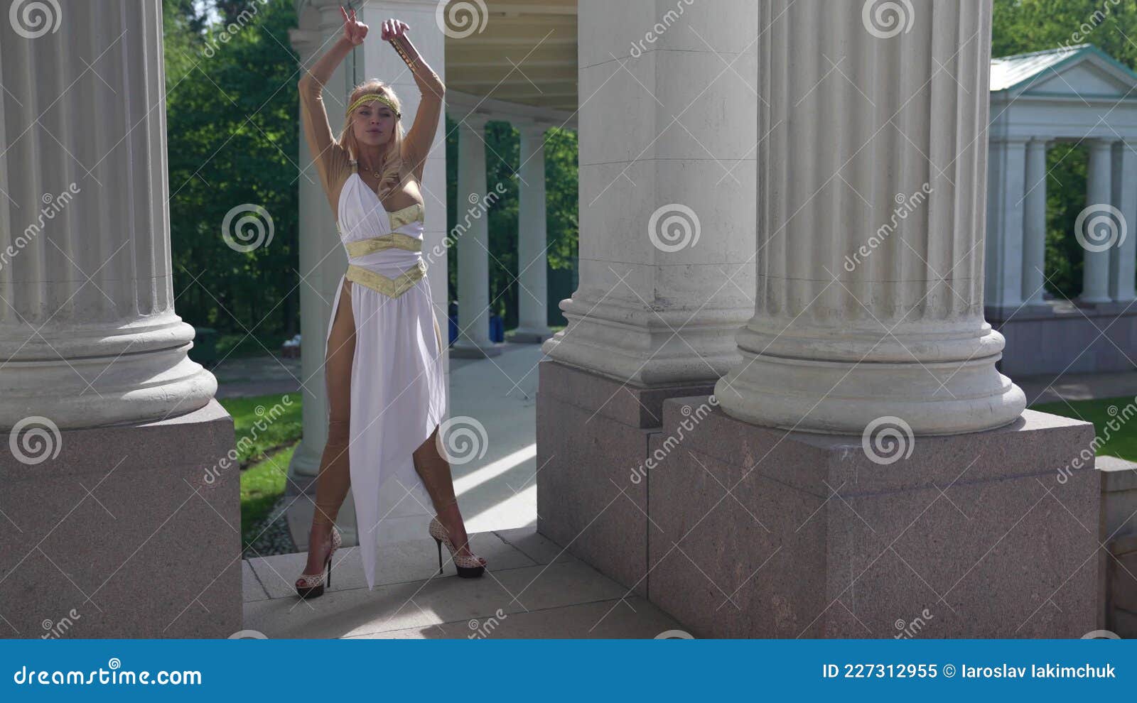 Alluring Busty Lady Is Dressed Like Ancient Greece Goddess Is Posing
