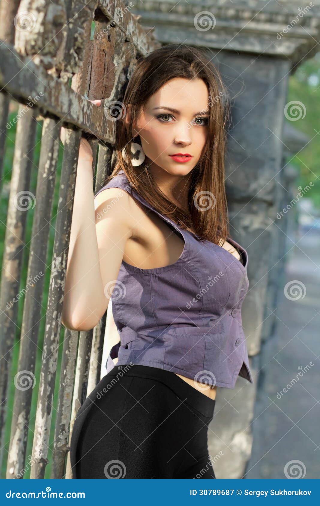 Alluring young lady stock image. Image of beautiful, fence - 30789687