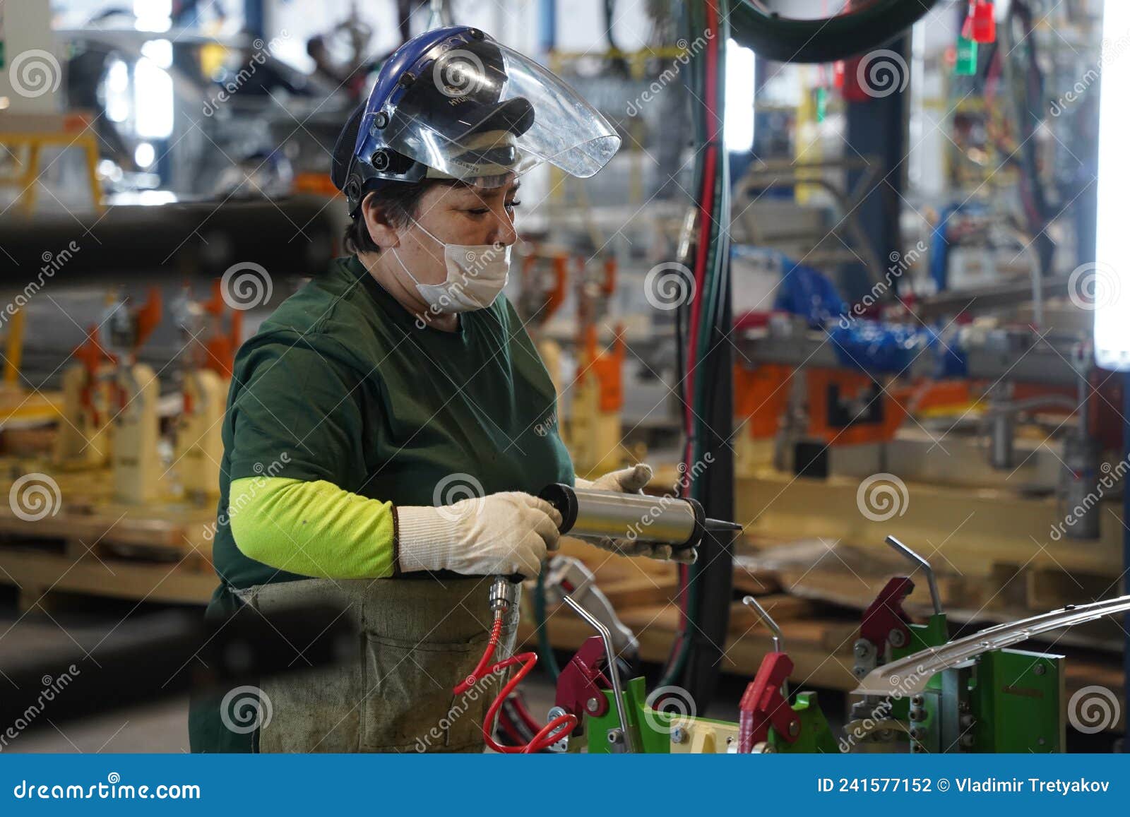 A Technician Applies White Thermal Paste To The CPU Intel I7-9700K ... A Technician Applies White Thermal Paste To The CPU Intel I7-9700K ...