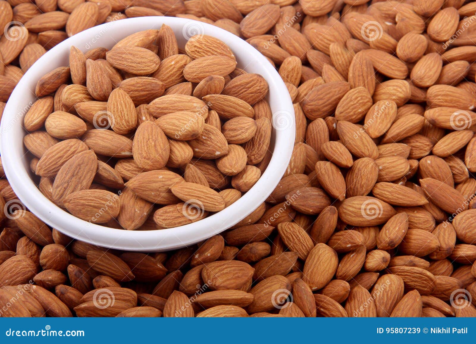 Almond in bowl stock image. Image of ingredient, salted - 95807239