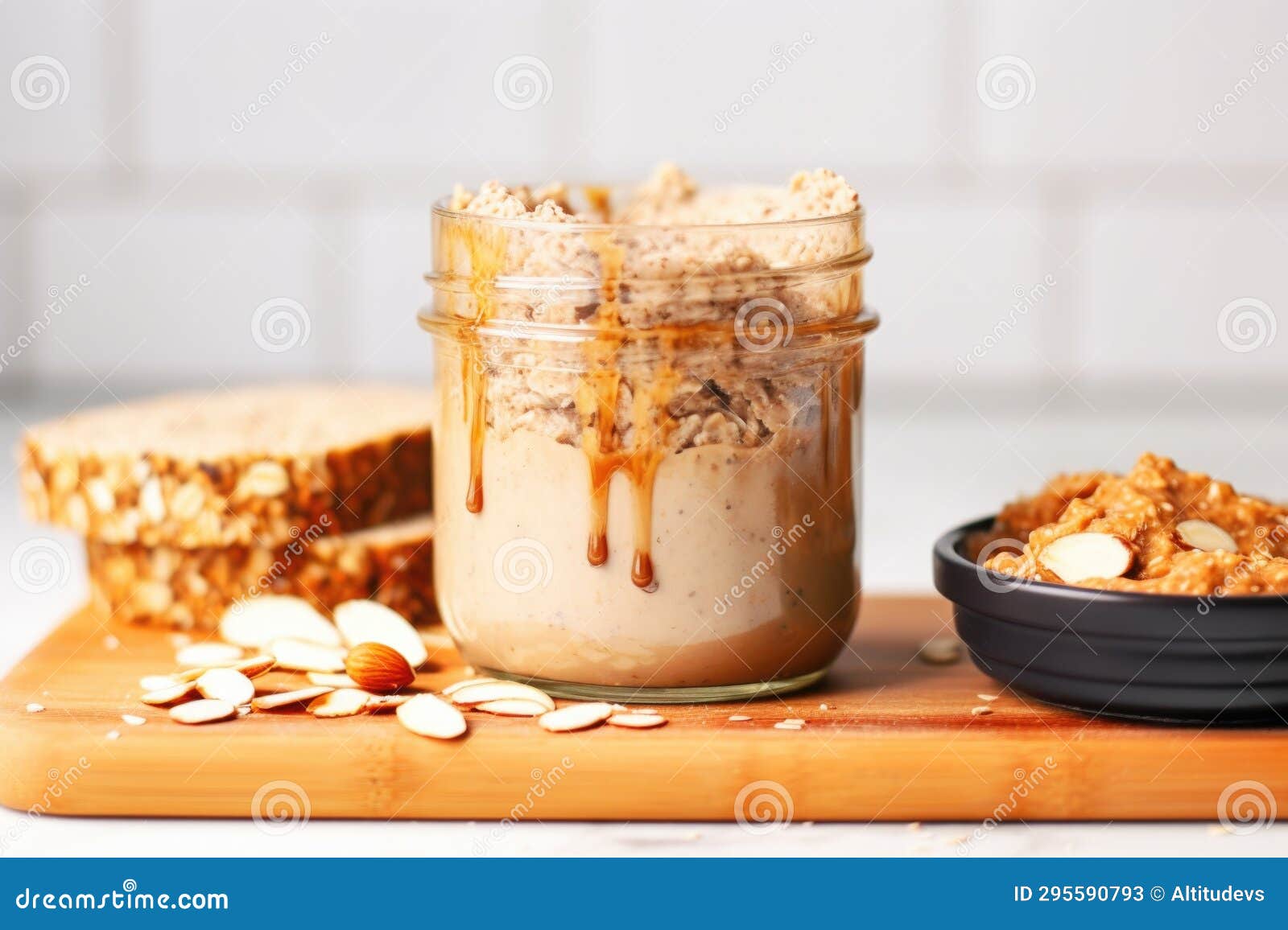 Almond Butter Smeared Toast beside a Jar with Open Lid Stock Image ...
