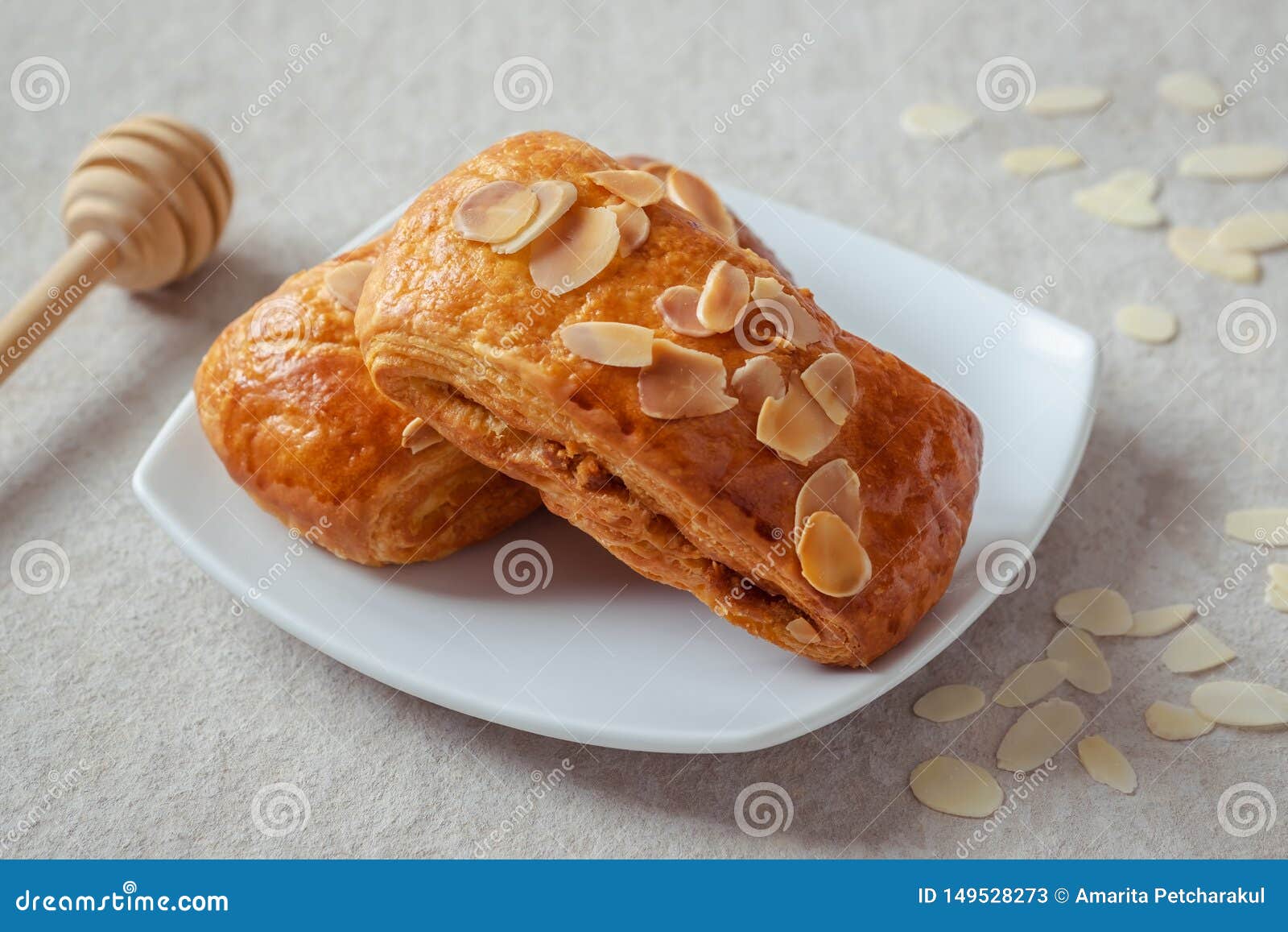 Almond Danish Pastry on White Plate Stock Image - Image of nuts, sweet ...