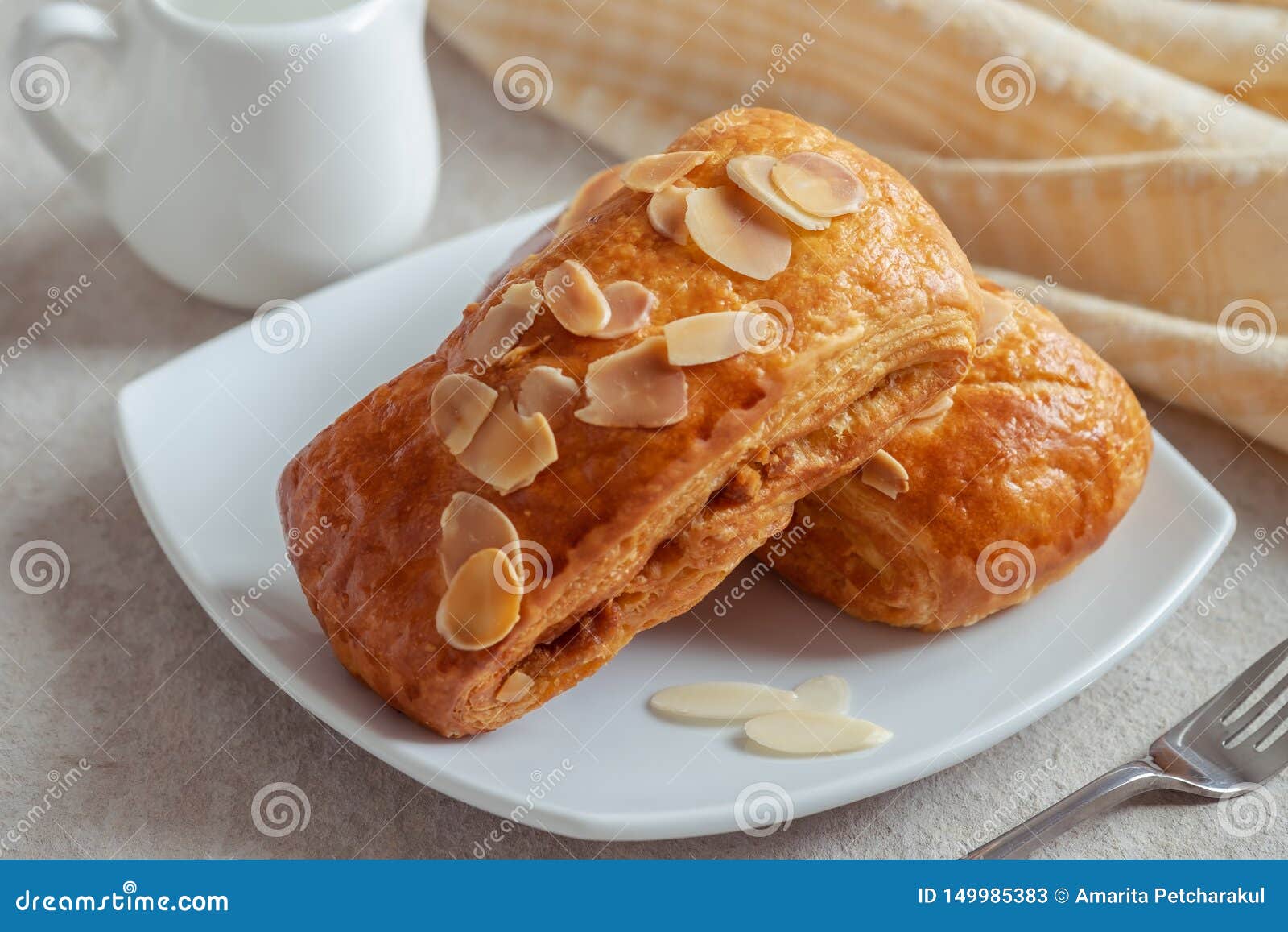 Almond Danish Pastry on White Plate Stock Image - Image of almonds ...