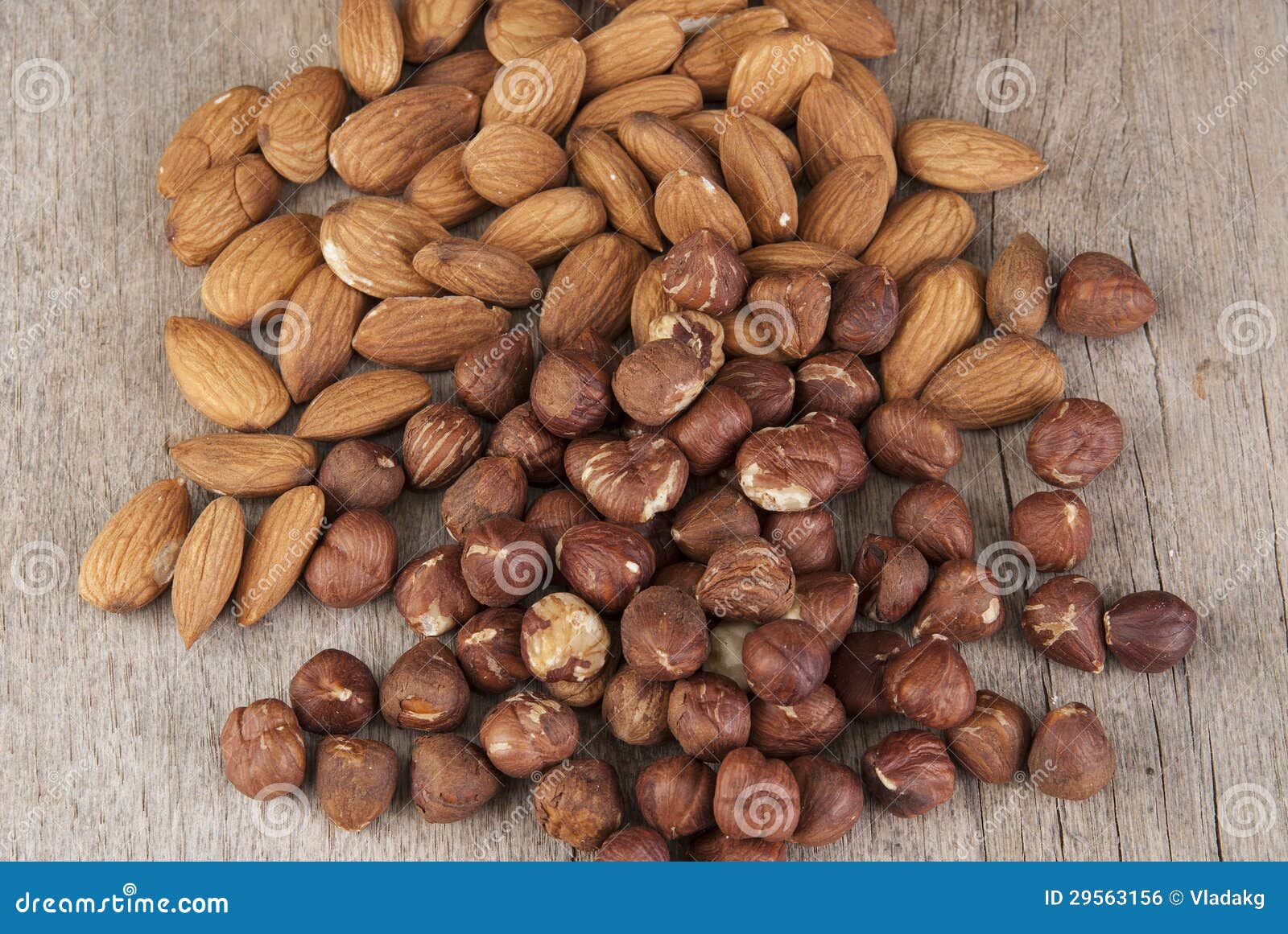 Almond and Hazelnut on the Wooden Table Stock Photo - Image of ...