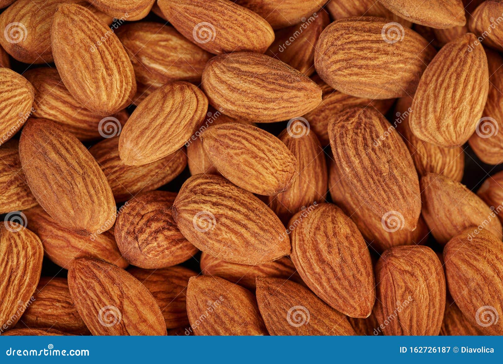 Almond nut texture closeup stock image. Image of seed - 162726187