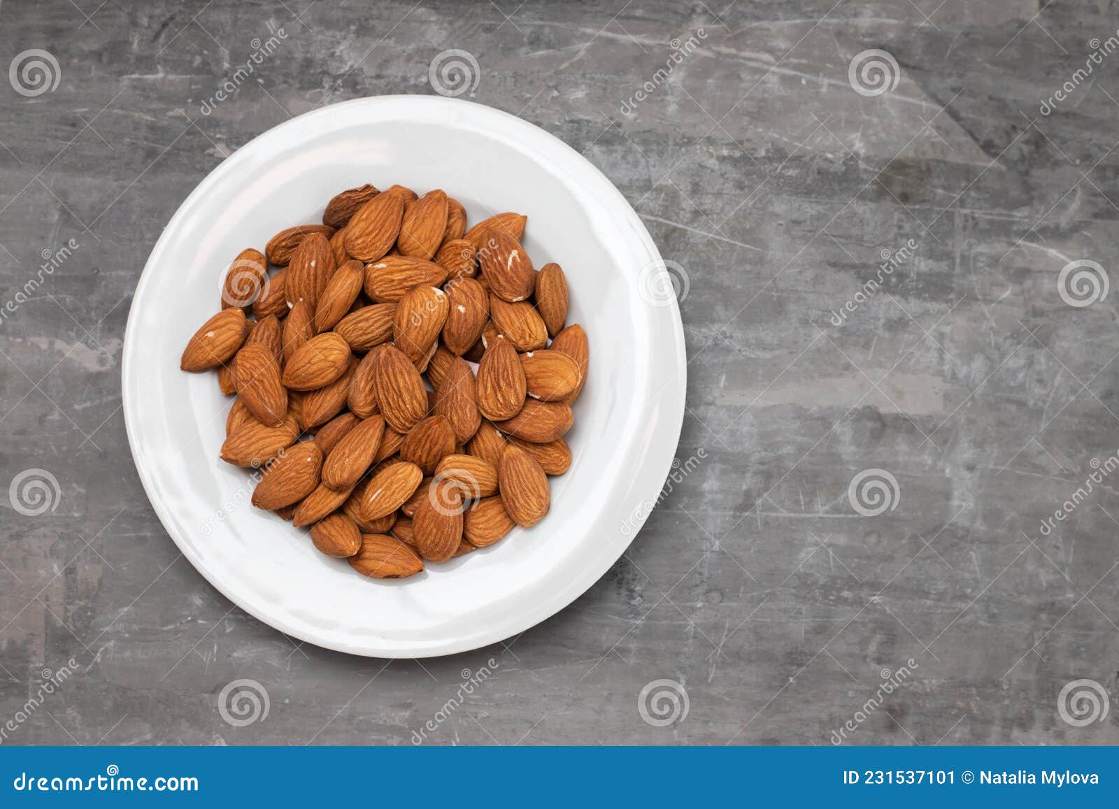 Almond on White Small Plate on Ceramic Stock Image - Image of macro ...