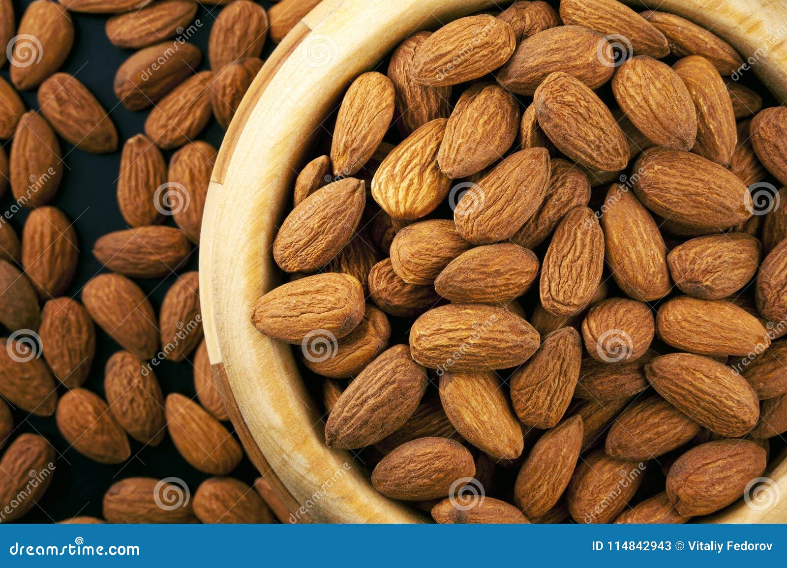 Almonds on Blue Background and in Pot Stock Image - Image of organic ...