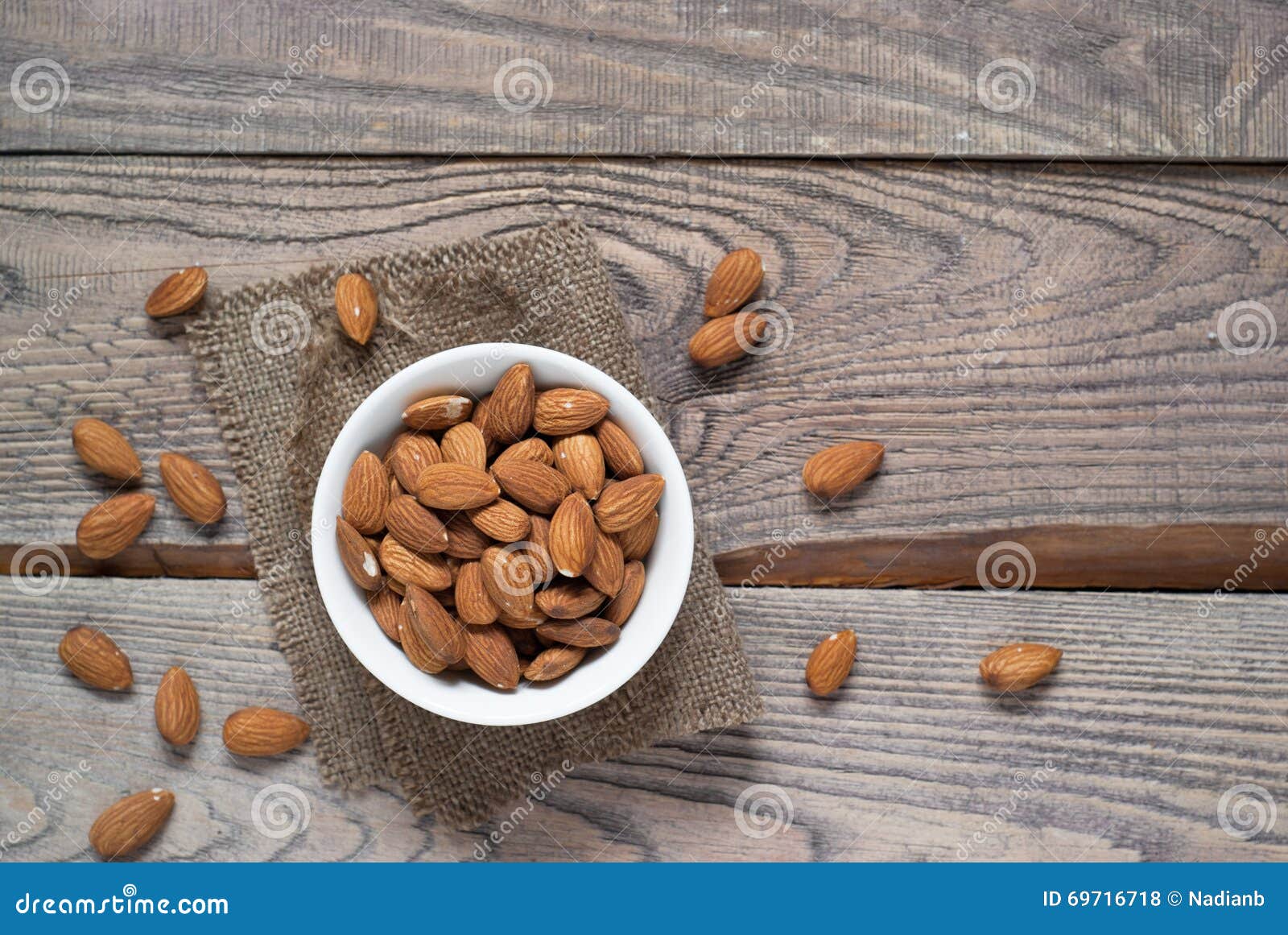 Almonds in a bowl stock photo. Image of wooden, healthy - 69716718