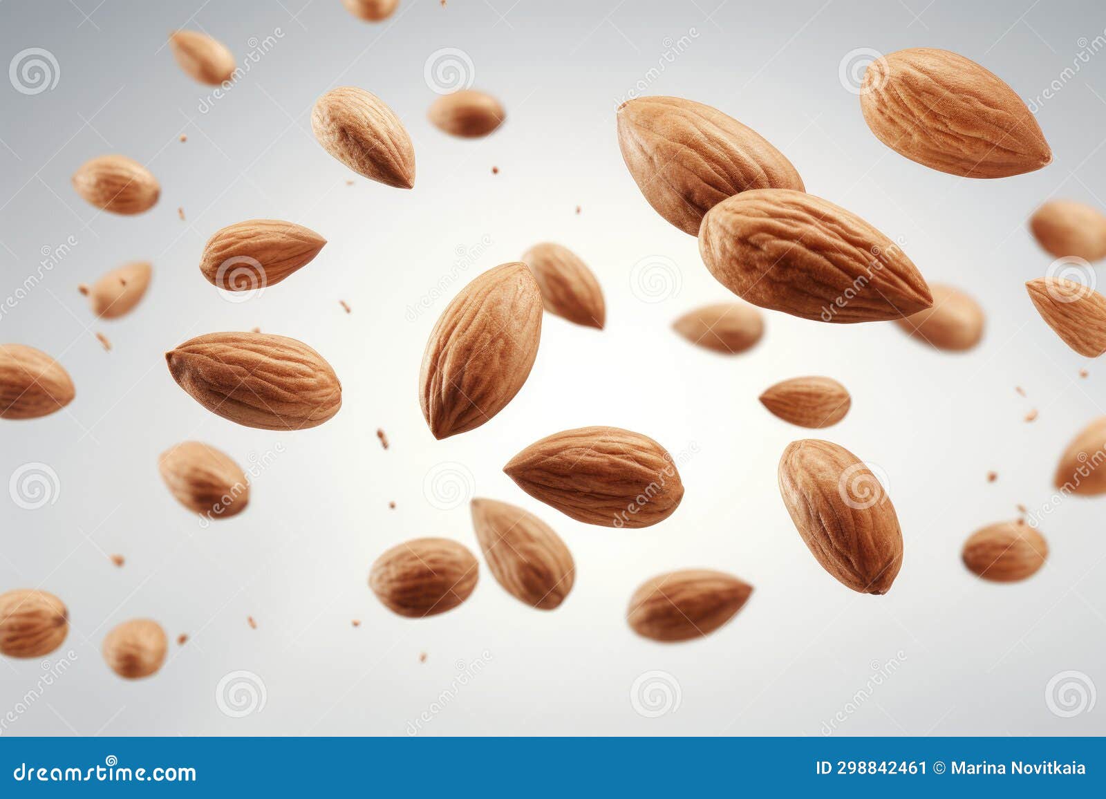 Almonds Fall in Pile on Gray Gradient Background. Creative Concept of ...