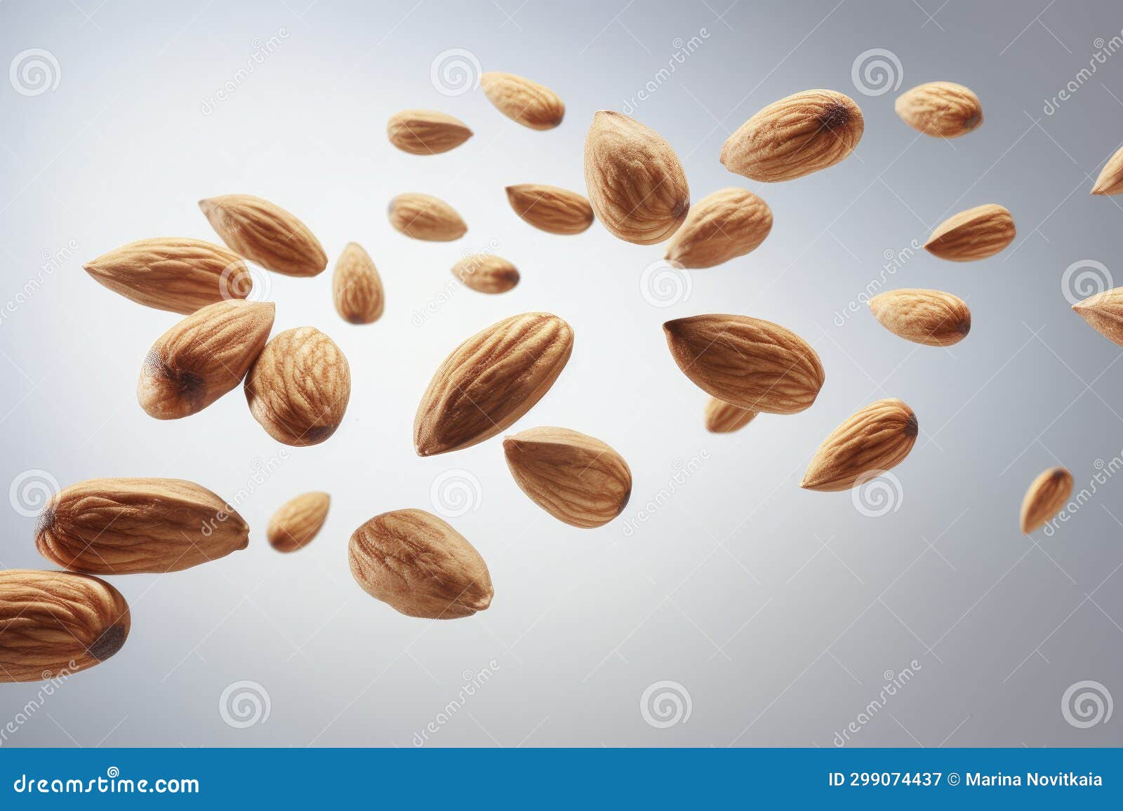 Almonds Fall in Pile on Gray Gradient Background. Creative Concept of ...