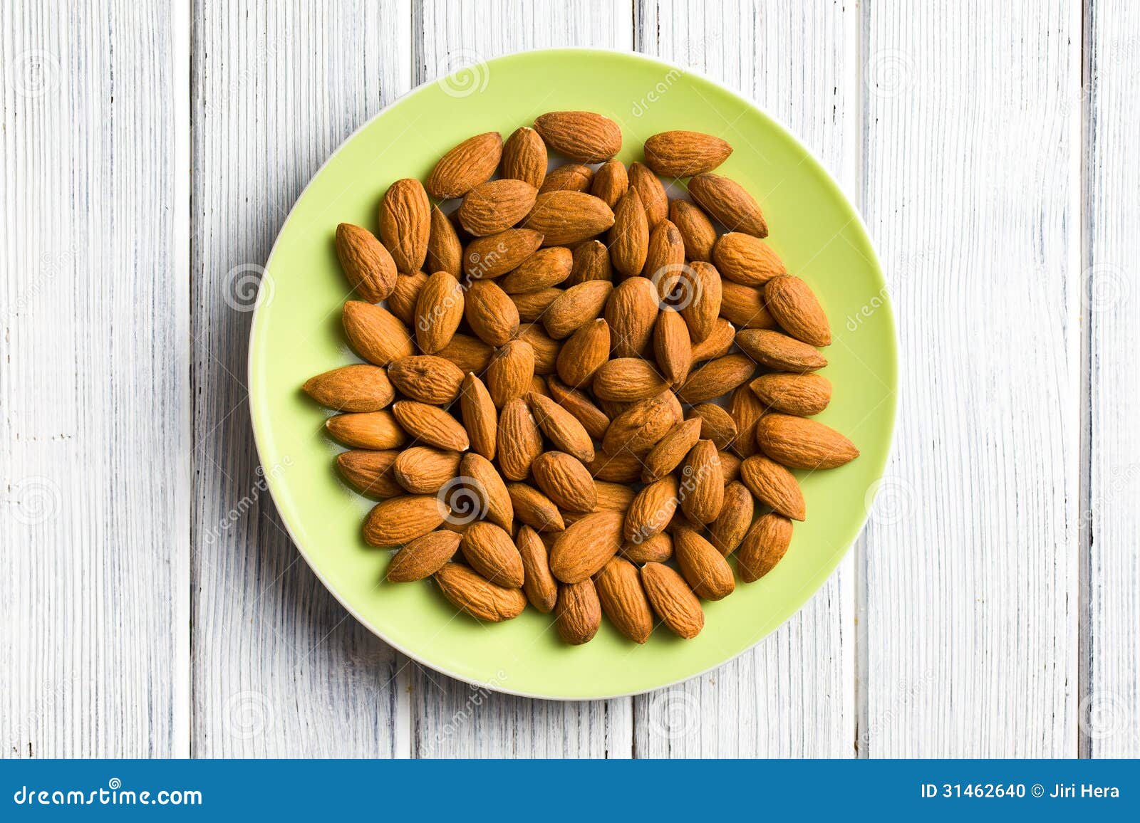 Almonds on plate stock photo. Image of snack, natural - 31462640