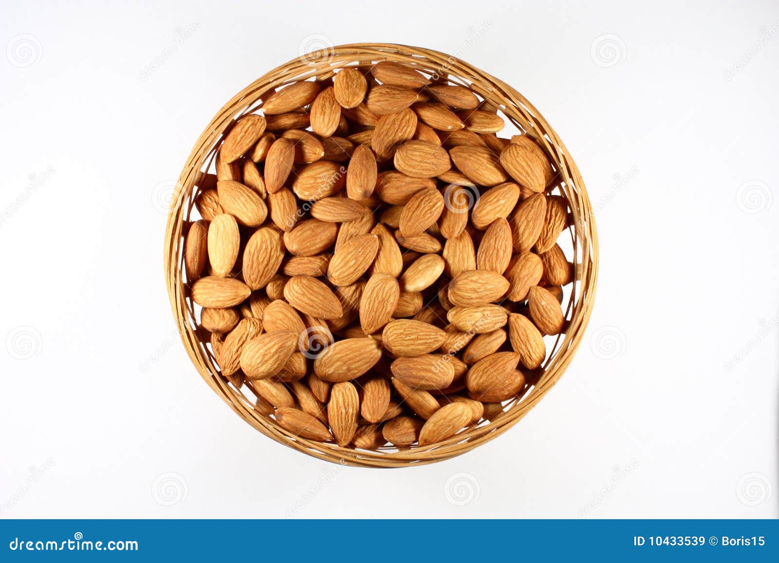 Almonds in a round basket stock image. Image of basket - 10433539