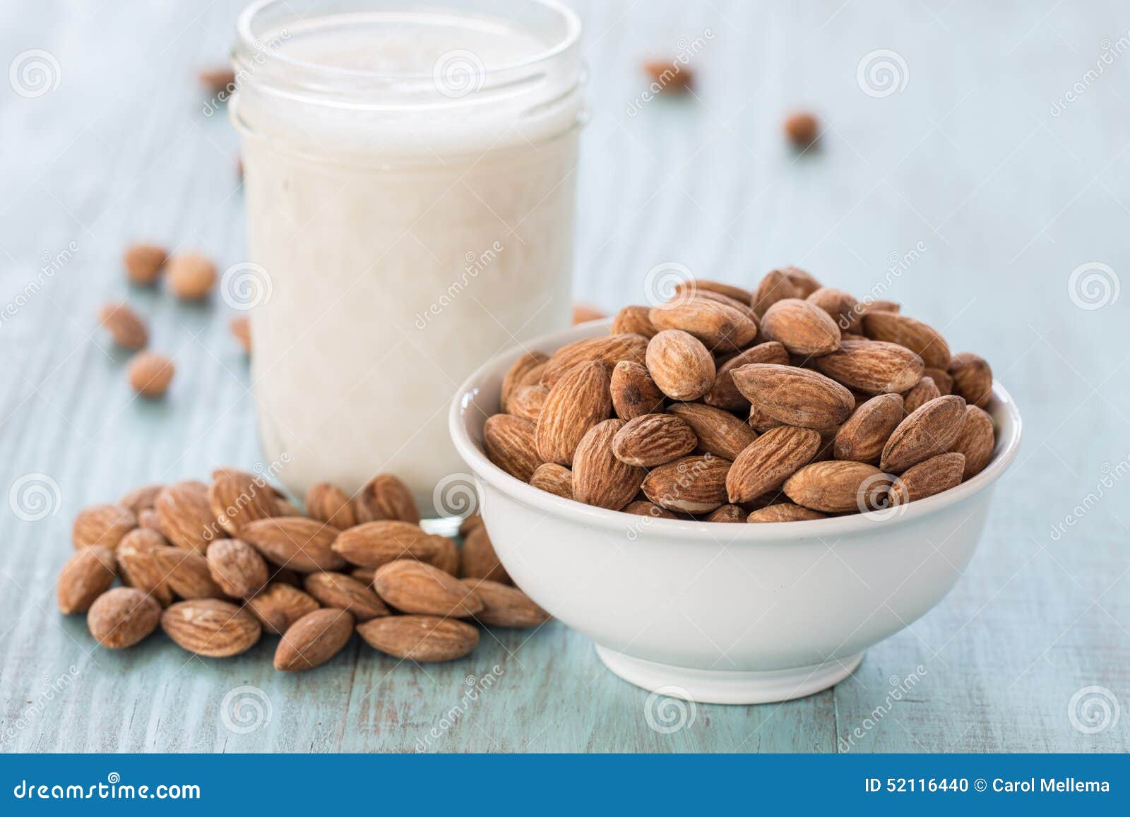Almonds Scattered on Wood Background Stock Photo - Image of vegan, heap ...