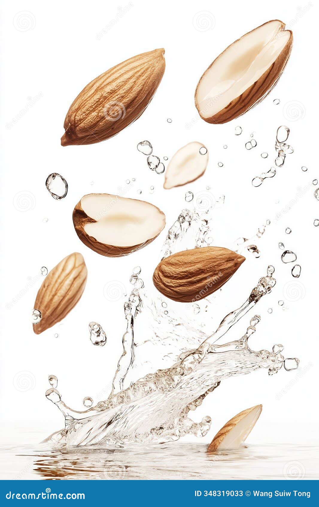 Almonds Splashing into Water Creating a Refreshing Image Stock ...
