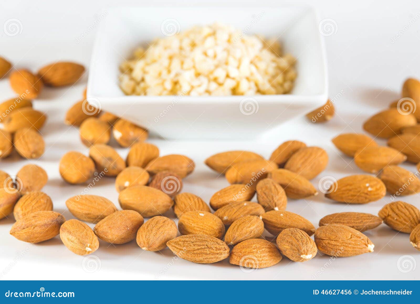 Almonds, whole and minced stock photo. Image of ready - 46627456