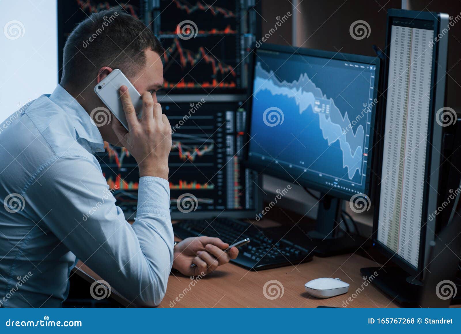 Alone in the Room. Man Working Online in the Office with Multiple ...