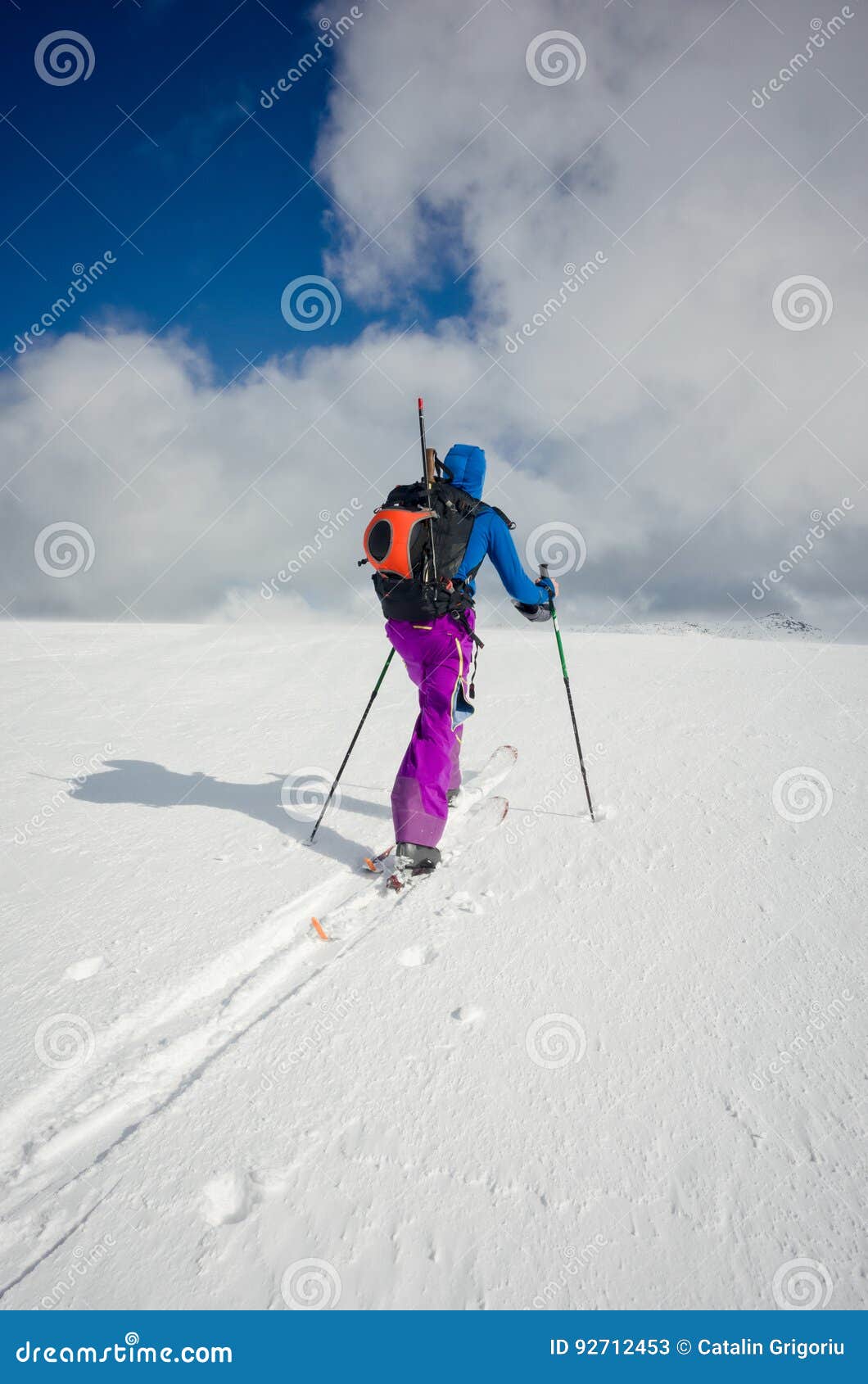 Alone Skier Walking through the Untouched Snow Stock Image - Image of ...