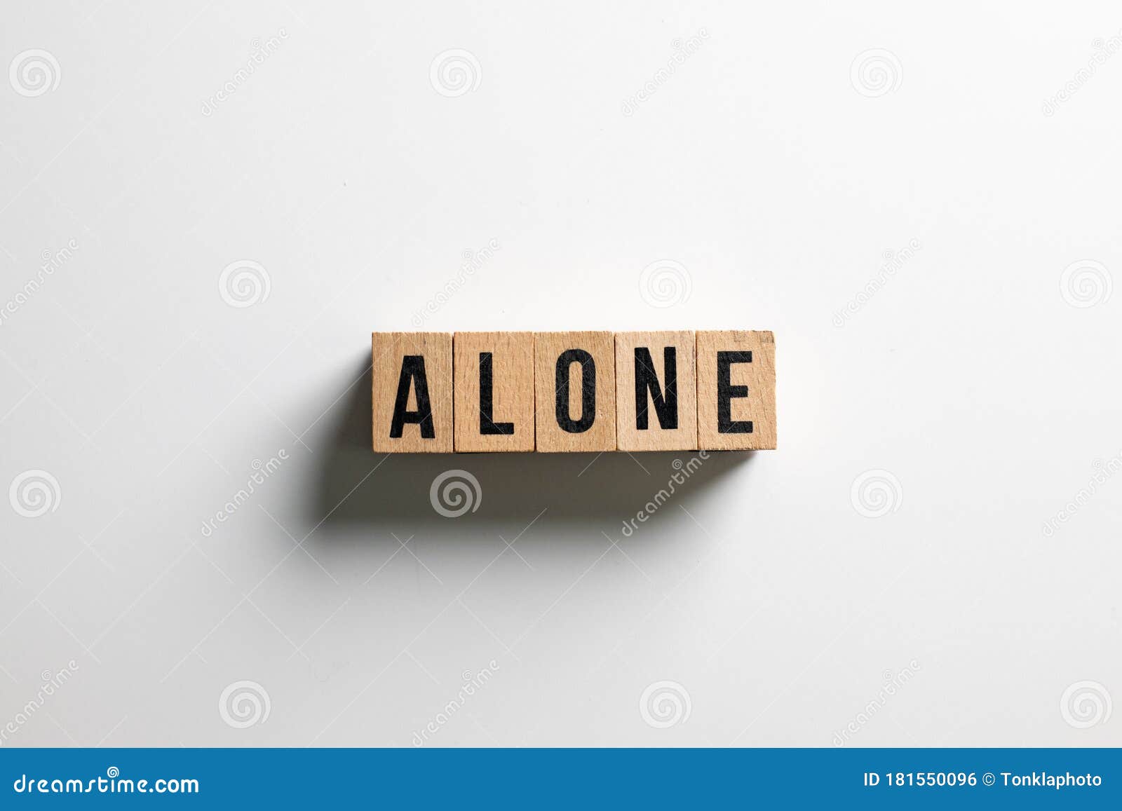 ` Alone ` Text Made of Wooden Cube on White Background Stock Photo ...