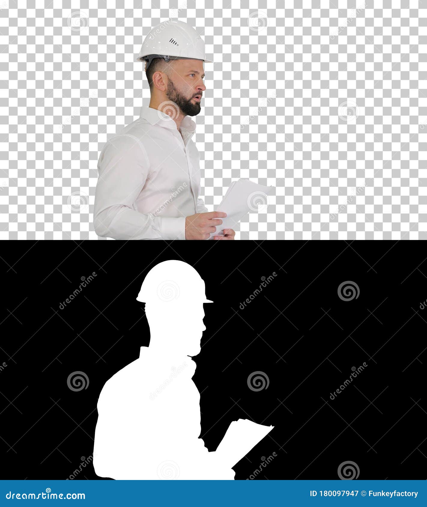 Male Engineer Walking in a Hard Hat Looking at Documents, Alpha Stock ...
