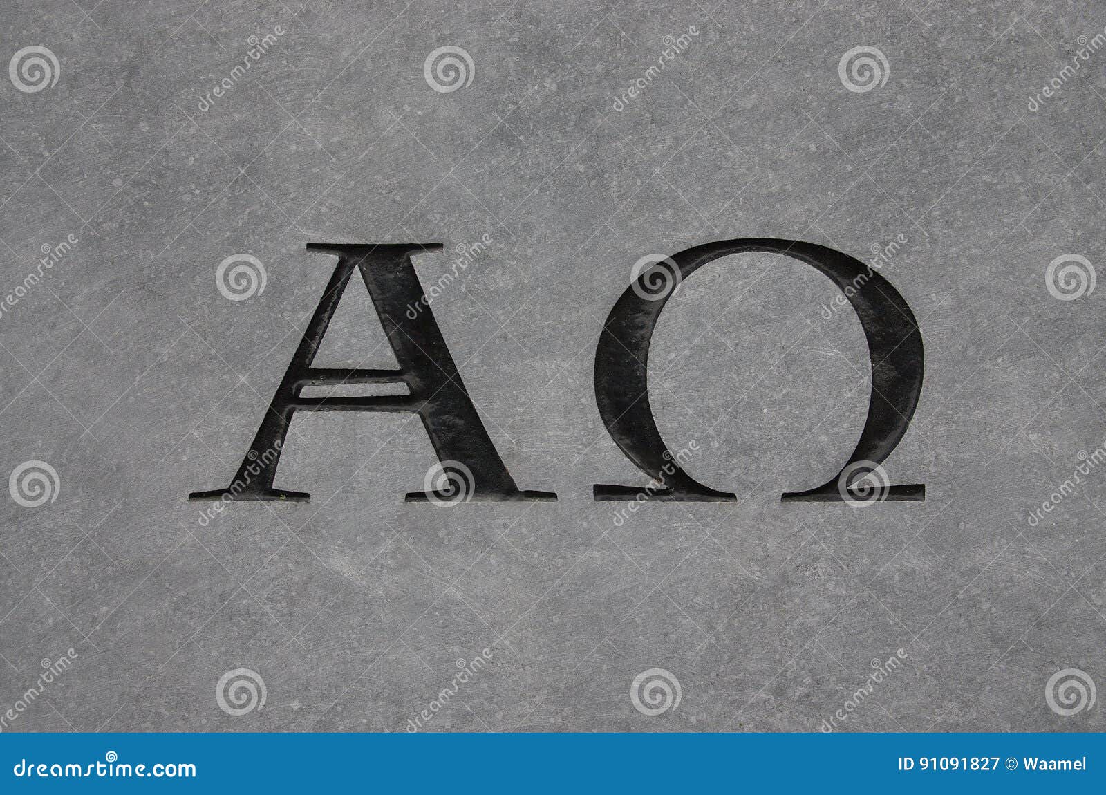 Alpha and Omega in stone stock image. Image of beginning - 91091827