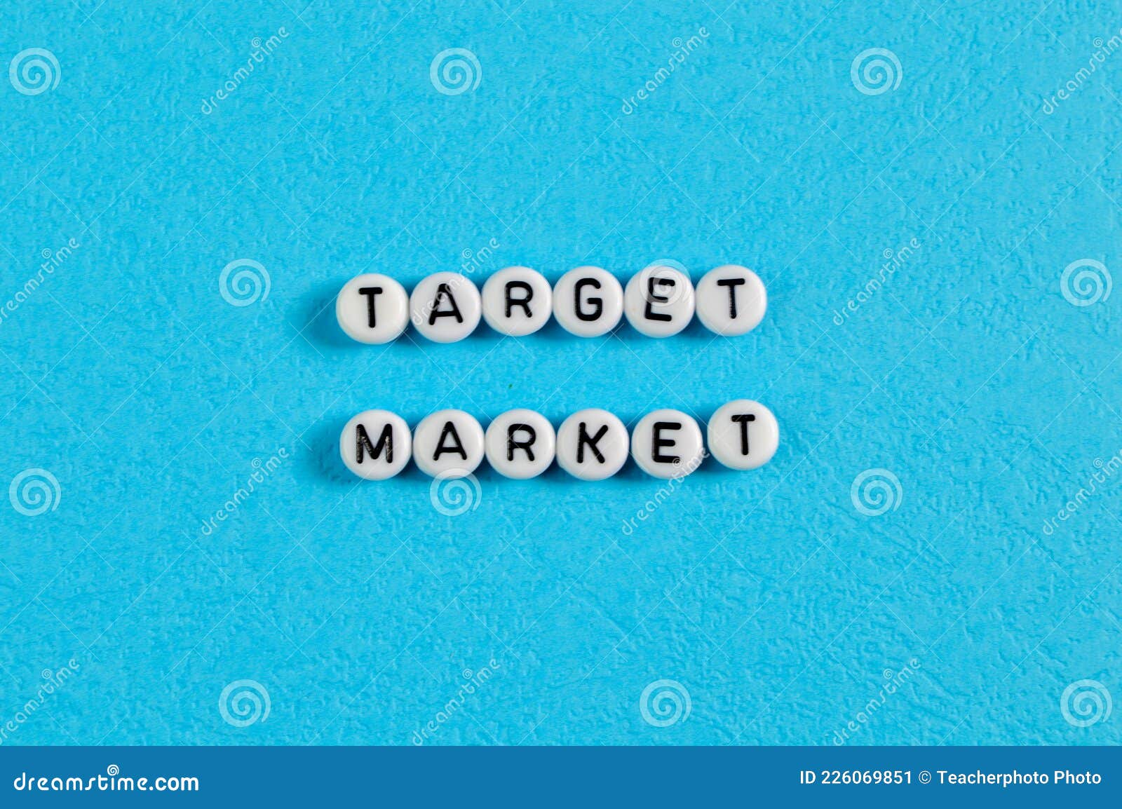 Alphabet Beads with Text TARGET MARKET Isolated on Blue Background ...