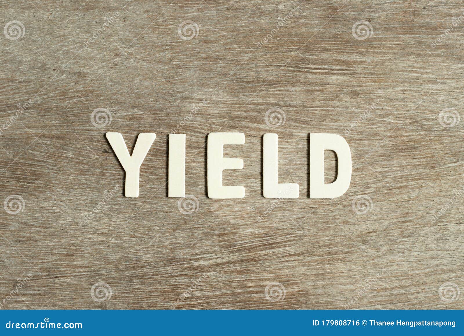 Alphabet in Word Yield on Wood Background Stock Photo - Image of ...
