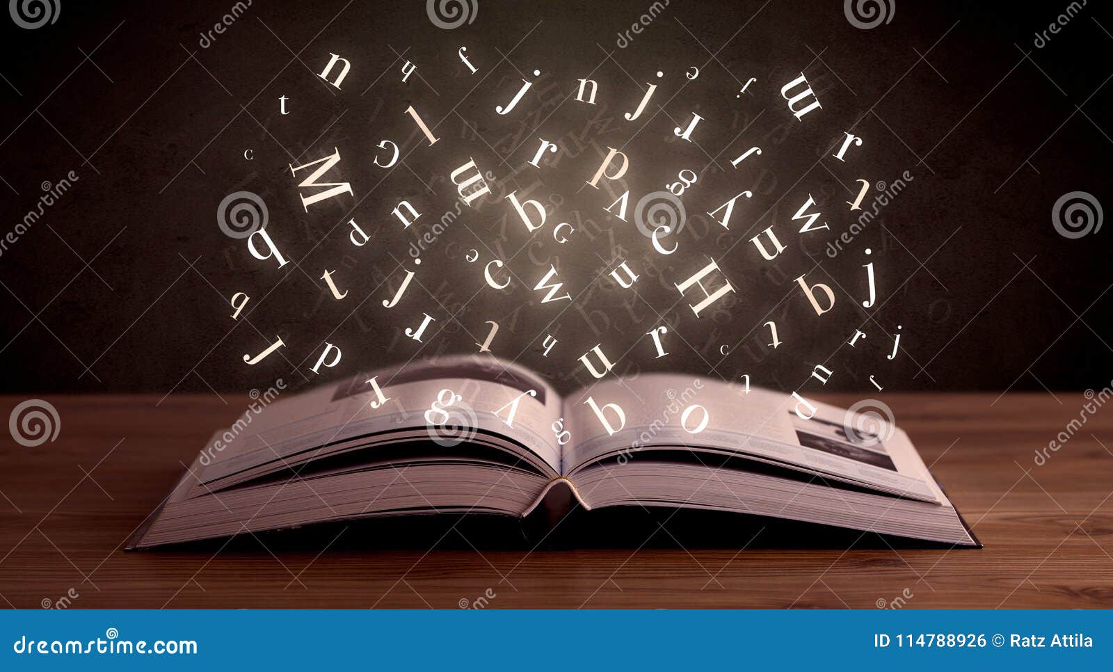 Alphabet letters over book stock photo. Image of lights - 114788926