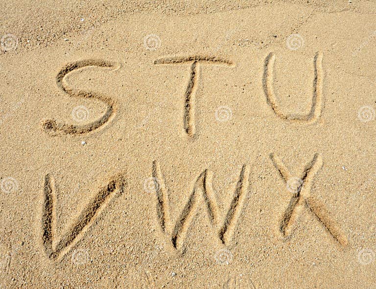 Alphabet Letters in Sand on Beach Stock Image - Image of ocean, style ...