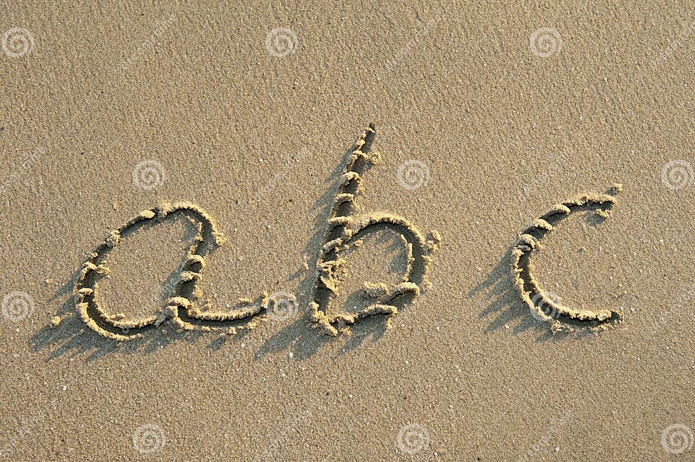 Alphabet Letters in Sand on Beach Stock Photo - Image of language ...