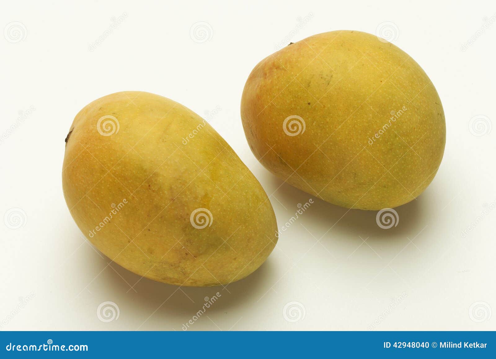 Alphonso Mango Tropical Fruit On Green Leaf Background Royalty-Free ...