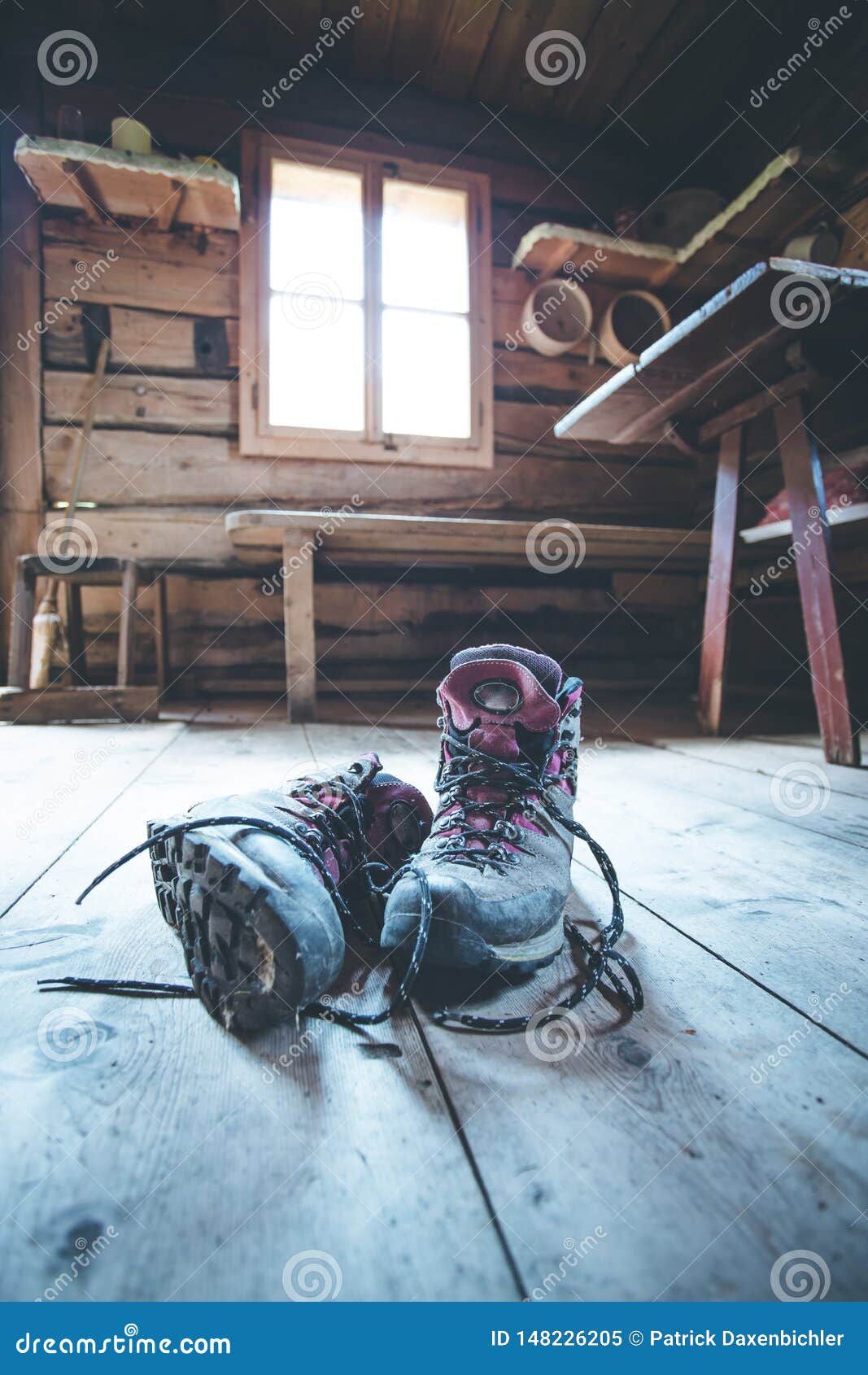 Alpine Boots on Rustic Wood Floor in an Abandoned Mountain Chalet in ...