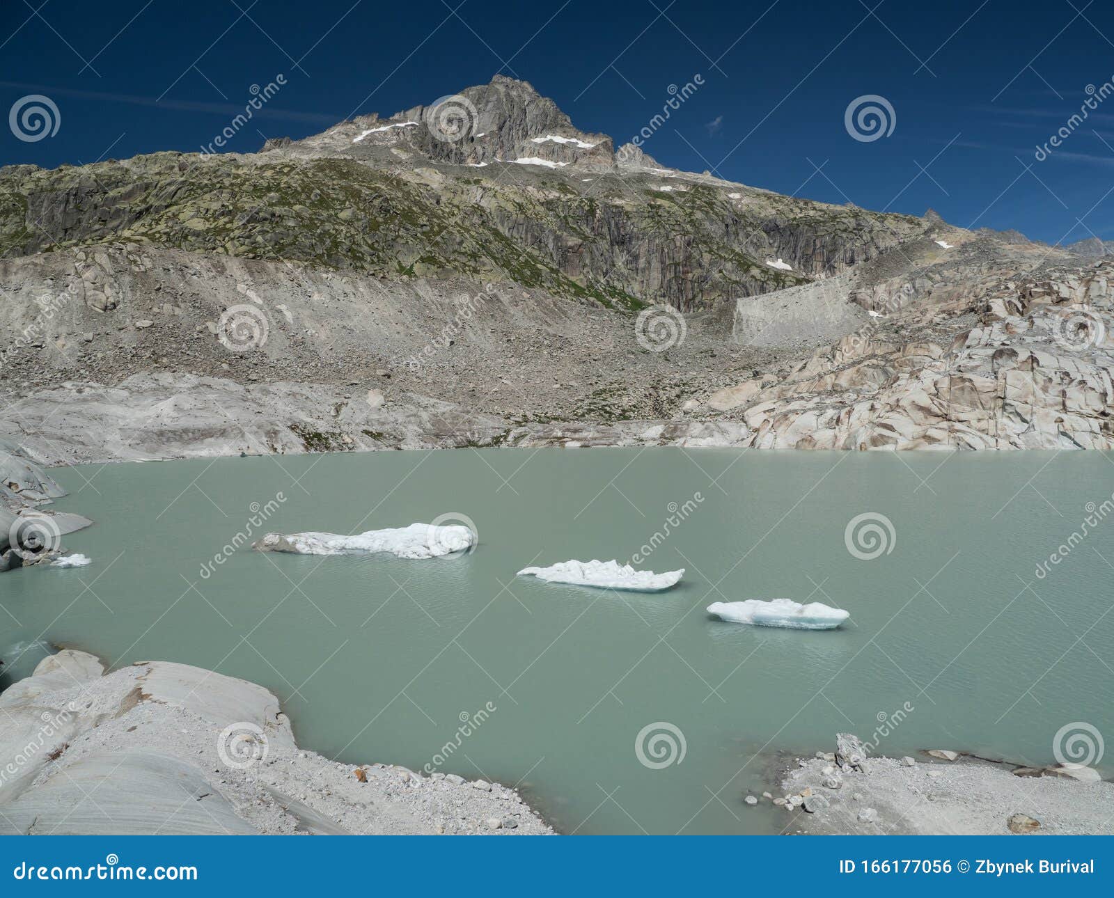 Alpine Glacier Lake with Floating Icebergs and Sharp Peaks Stock Photo ...