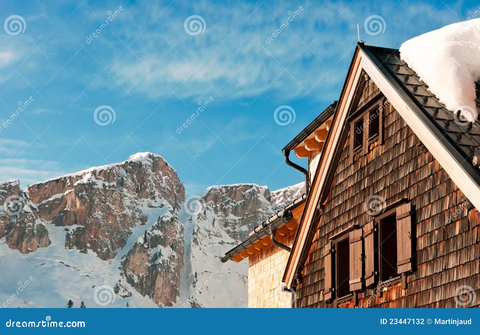 Alpine Hut in Front of a Mountain Peak in Winter Stock Photo - Image of ...