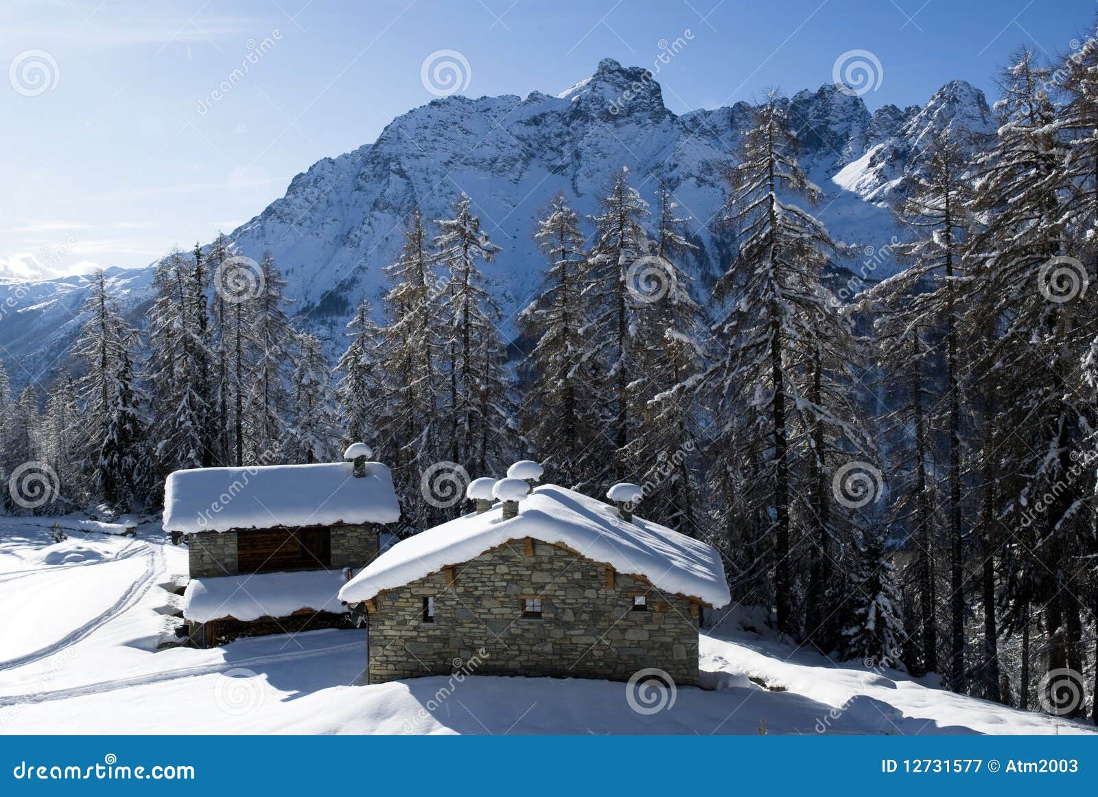 Alpine huts under snow stock image. Image of magical - 12731577