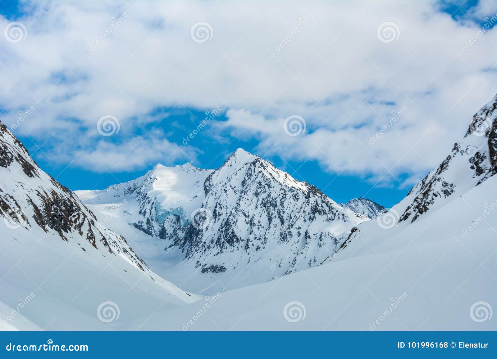 Alpine Landscape with Peaks Covered by Snow and Clouds Stock Photo ...