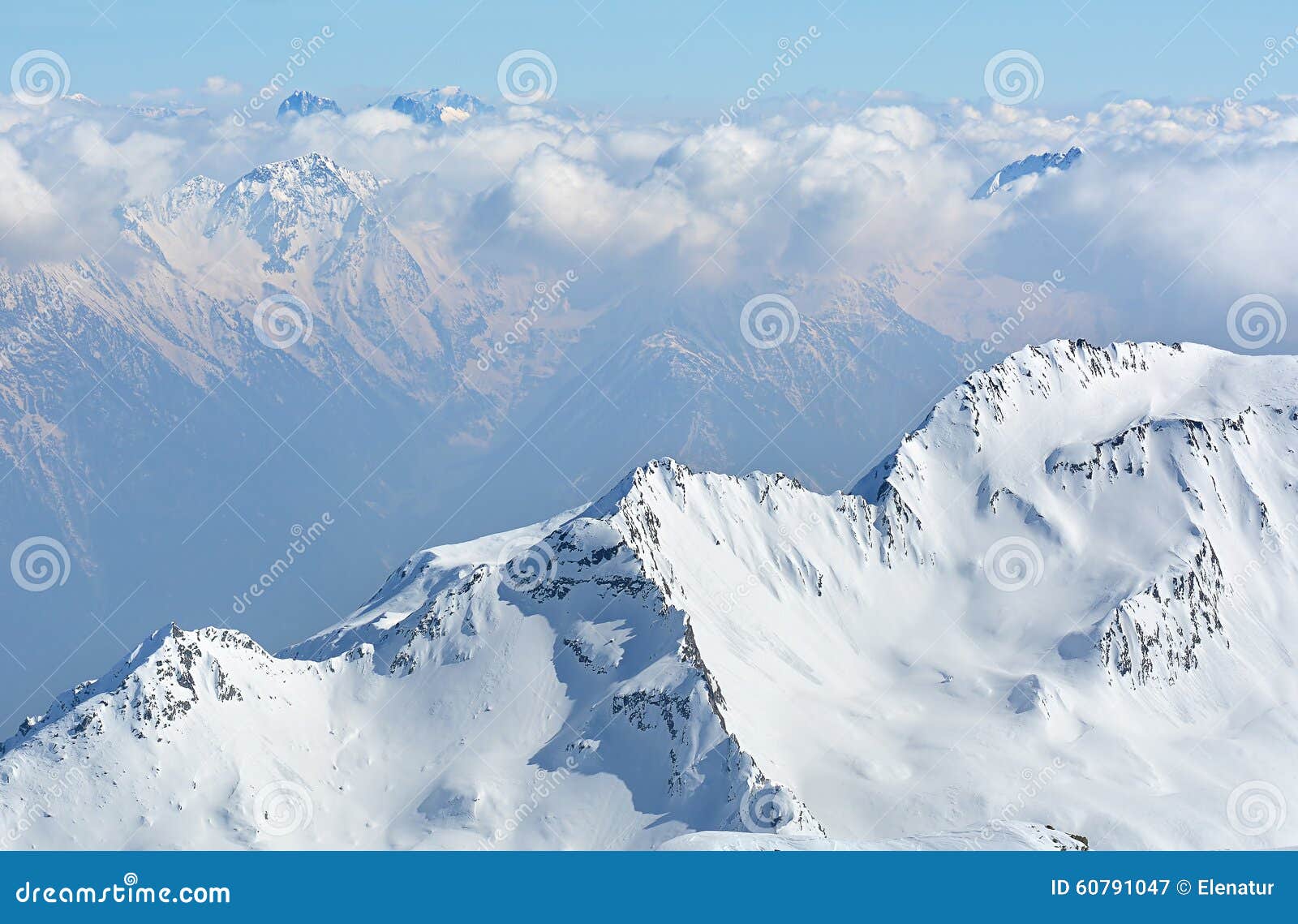 Alpine Landscape with Peaks Covered by Snow and Clouds Stock Image ...